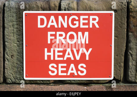 danger from heavy seas warning sign Stock Photo - Alamy