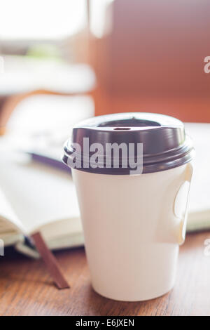 Closed message on wooden table Stock Photo - Alamy