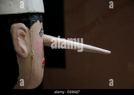 Figure of wooden puppet Pinocchio with long nose. Italy Stock Photo - Alamy