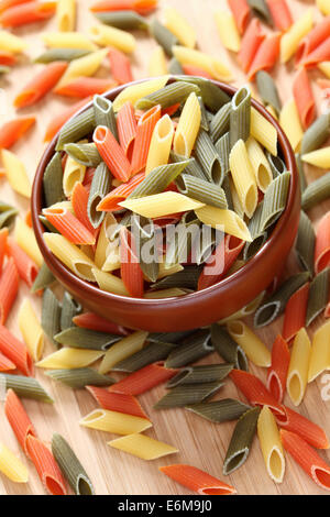 Green colored penne pasta. Food background Stock Photo - Alamy