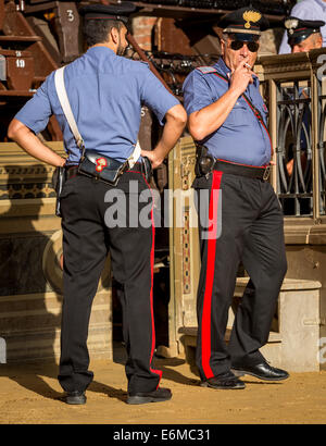 full length of Two Arma Dei Carabinieri Italian police officers on duty ...