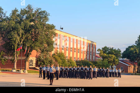 A troop of RCMP cadets standing at ease at the RCMP Depot cadet ...