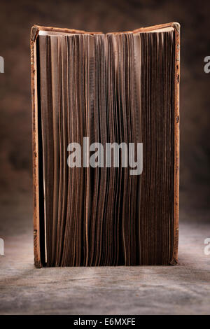 Old tattered book Stock Photo - Alamy