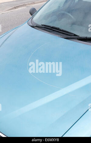 Scratched paint vandalized car bonnet UK Stock Photo - Alamy