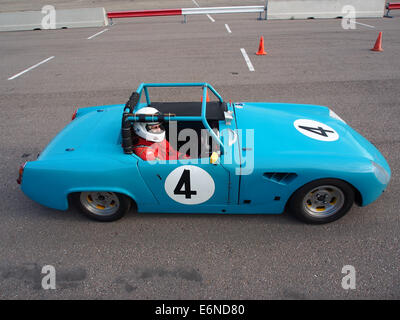 The Austin Healey Sprite MKII, number 4, racing at Zandvoort. This ...