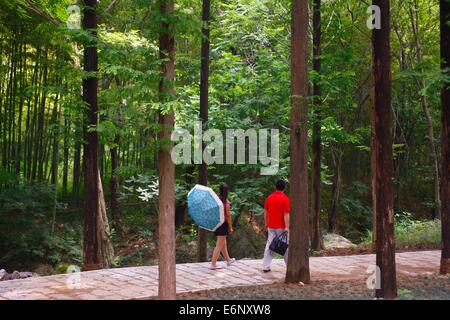 Hefei, China's Anhui Province. 3rd Apr, 2014. A woman takes photos of ...