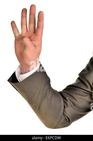 Man holding up four fingers with hand in a busy city street background ...