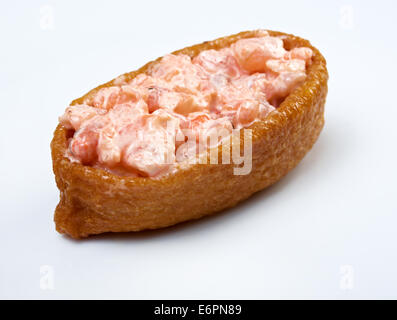 inari sushi with salmon and roe tobiko Stock Photo - Alamy