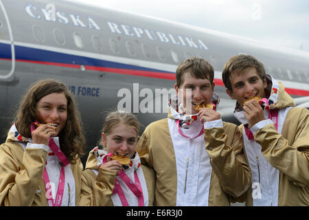 Members of the Czech team pose with medals from the Olympic Games of ...