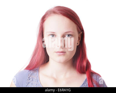 Young woman with a serious deadpan expression showing absolutely no ...