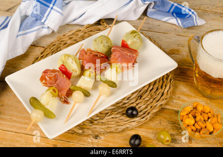 Sekwerd serrano ham tapa served with beer Stock Photo - Alamy