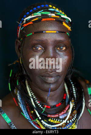 Woman From Anuak Tribe In Traditional Clothing, Gambela, Ethiopia Stock ...