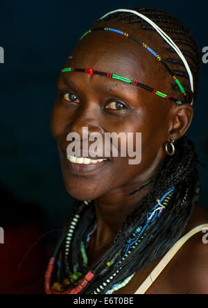 Woman From Anuak Tribe In Traditional Clothing, Gambela, Ethiopia Stock ...