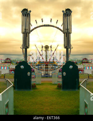 Amusement rides at a county fair at sunset Stock Photo - Alamy