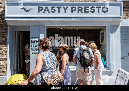 Tourists outside Cornish pasty shops in Padstow, Cornwall, England, UK ...