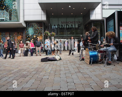 The Band "Glass Caves" Busking in Manchester City Centre, England Stock ...