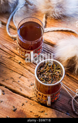 Warming tea served in old-fashioned Stock Photo - Alamy