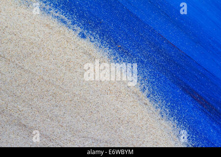 Marine background with sand spilled on a wooden table Stock Photo - Alamy