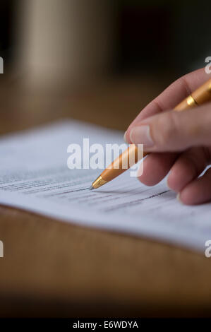 Model signing release form with pen Stock Photo - Alamy
