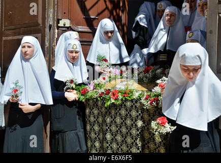 Portrait of Eastern Orthodox nuns during a Good Friday procession in ...