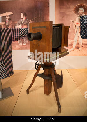 Antique large format camera with bellows on wooden tripod Stock Photo ...