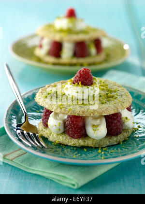 Raspberry cake with pistachio Stock Photo - Alamy