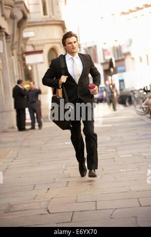 businessman rushing to work Stock Photo - Alamy