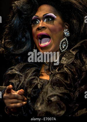 Portland, Oegon, USA. 31st Aug, 2014. Dresser ROB RHODES helps AQUASHA ...