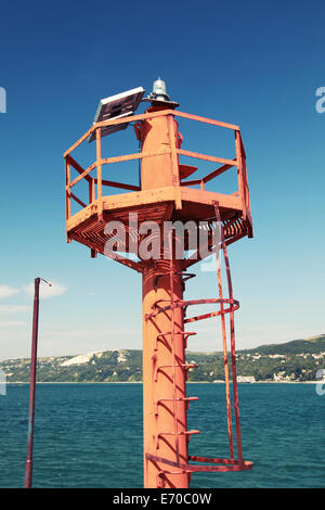Small lighthouse at the entrance to the marina on Isola di San Giorgo ...