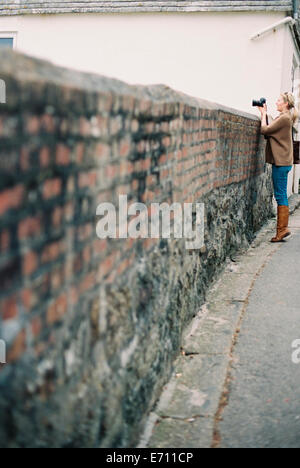 Looking over the wall Stock Photo: 309893171 - Alamy