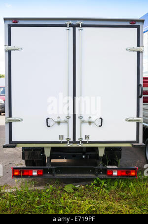Truck trailer - back view with closed doors Stock Photo - Alamy
