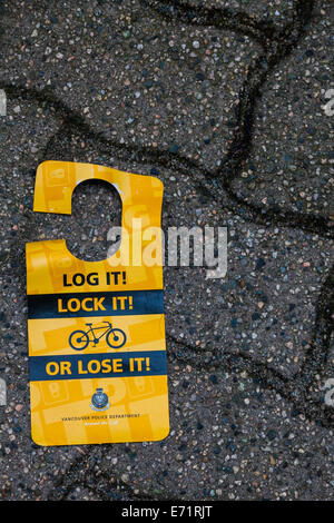 A "Have you locked your bike?" sign warning about bike theft in front ...