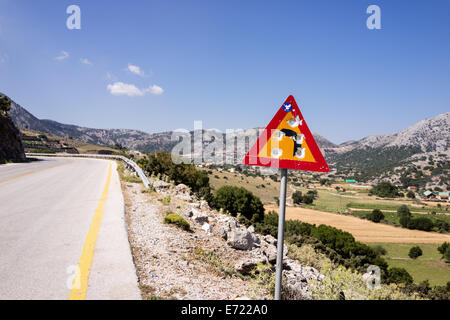 Road sign in lawless Crete Greece used by the Greeks as a target for ...