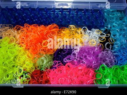 Pile of pink rubber loom bands Stock Photo - Alamy
