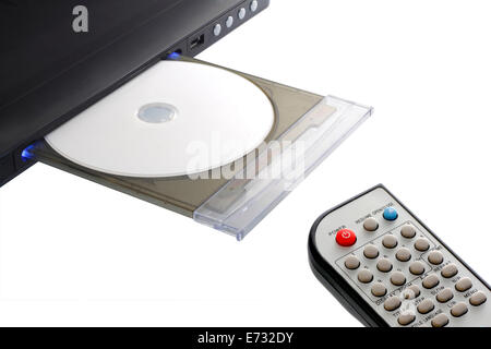 DVD player ejecting disc with remote control isolated on white ...