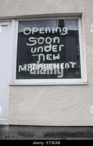 opening soon under new management sign in shop window in wales great ...