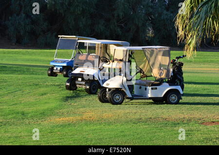 Golf carts on a golf course at Furnace Creek, California Stock Photo ...
