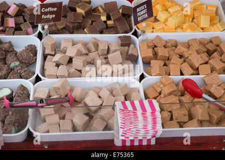 Flavoured fudge displayed at a sweet stall in England Stock Photo - Alamy