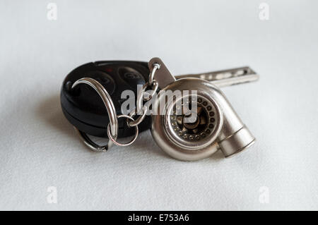 Car keys with a mini turbo key chain Stock Photo - Alamy