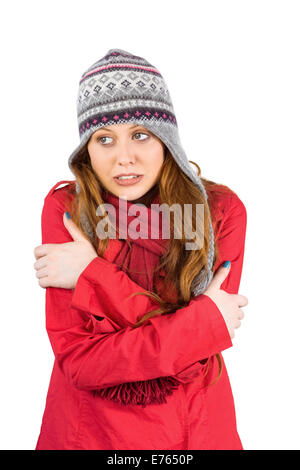 Redhead young woman wearing wool cap clueless and confused expression ...