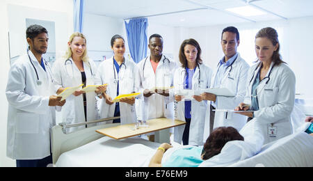 Doctor teaching residents in hospital room Stock Photo - Alamy
