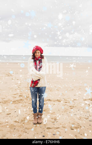Pretty woman in stylish warm clothing at beach Stock Photo - Alamy
