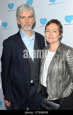 Damon Hill and his wife Susan George arrive for a screening of Hill ...