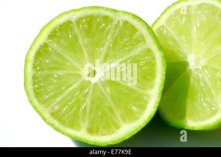Lime cut in half Stock Photo - Alamy