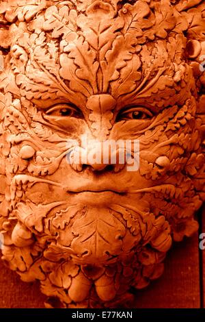 Green man sculpture face Stock Photo - Alamy