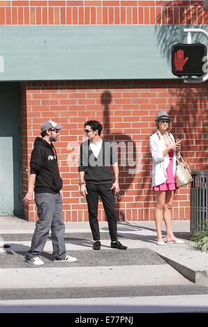 Corey Feldman dressed in the style of Michael Jackson with black shoes ...