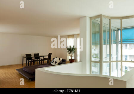 Bright duplex with hardwood floors, wide room with large window Stock ...