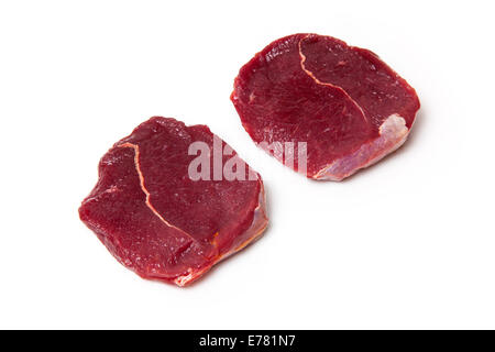 Raw Zebra steaks isolated on a white studio background Stock Photo - Alamy
