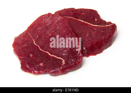 Raw Zebra steaks isolated on a white studio background Stock Photo - Alamy