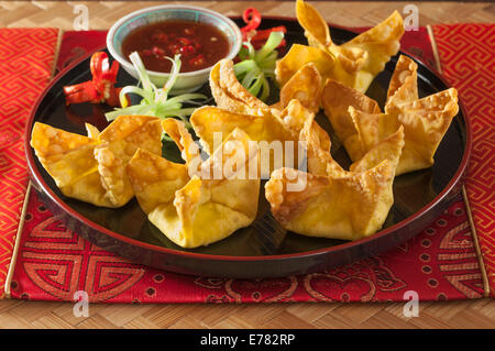 Crab Rangoon. American Chinese deep fried starter Stock Photo - Alamy
